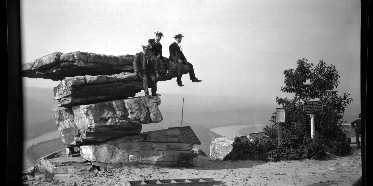 Three Men Sitting on a Rock Overlook, View from the Palisades ...