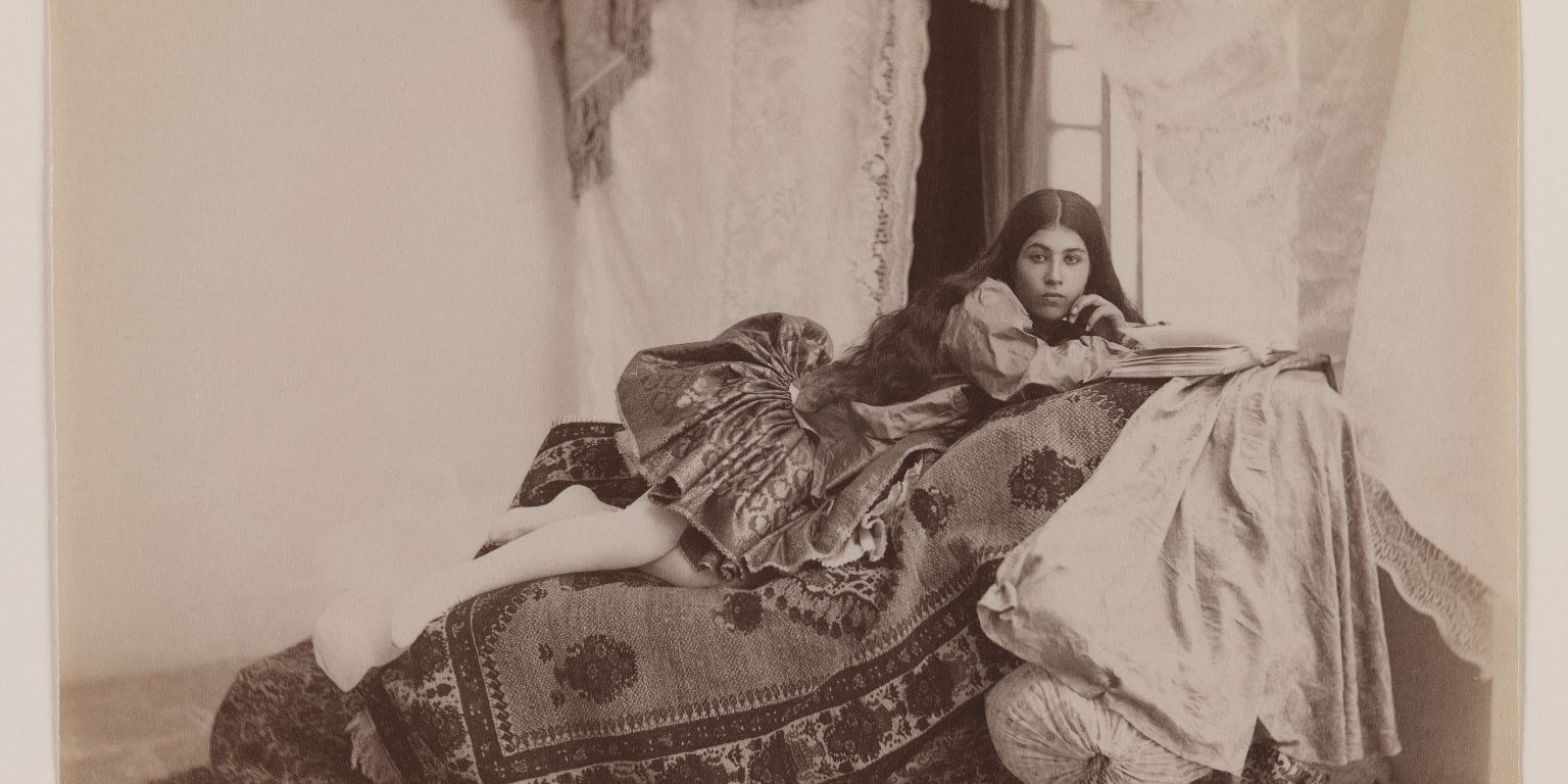 Studio Shot of a Reclining Lady Reading a Book · Brooklyn Museum