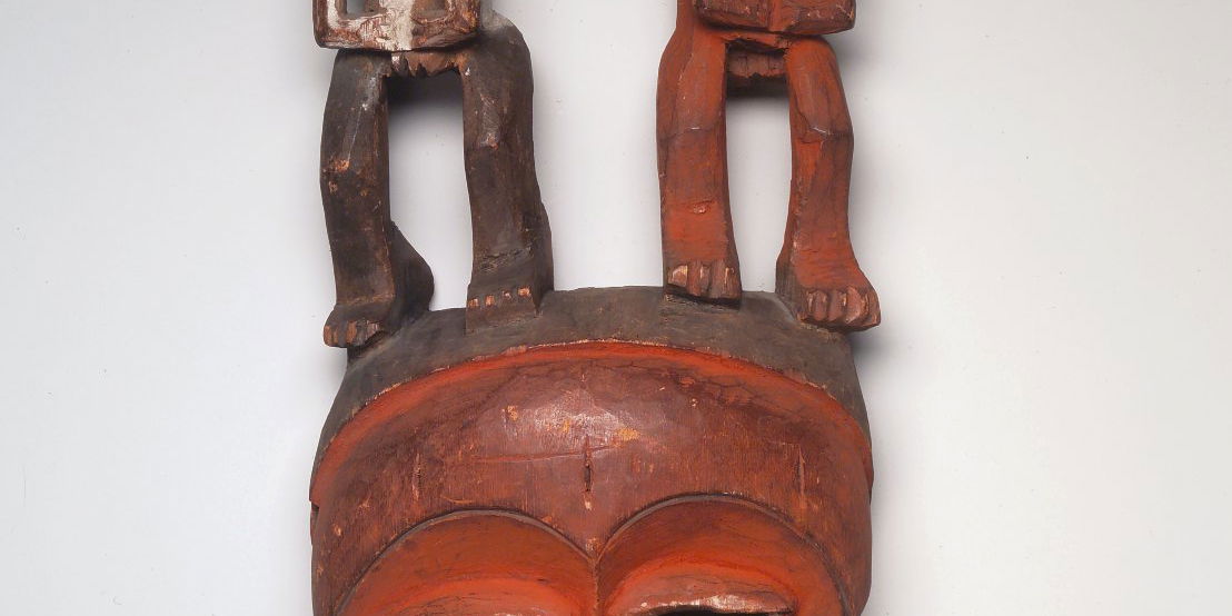 Triangular Mask Surmounted by Male and Female Figures · Brooklyn Museum
