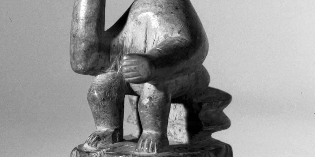 Figure of a Man Seated on a Stool · Brooklyn Museum