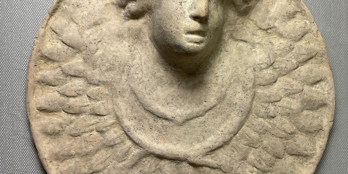 Molded Plaque with Sculptural Head Framed by Leaves and Vines ...
